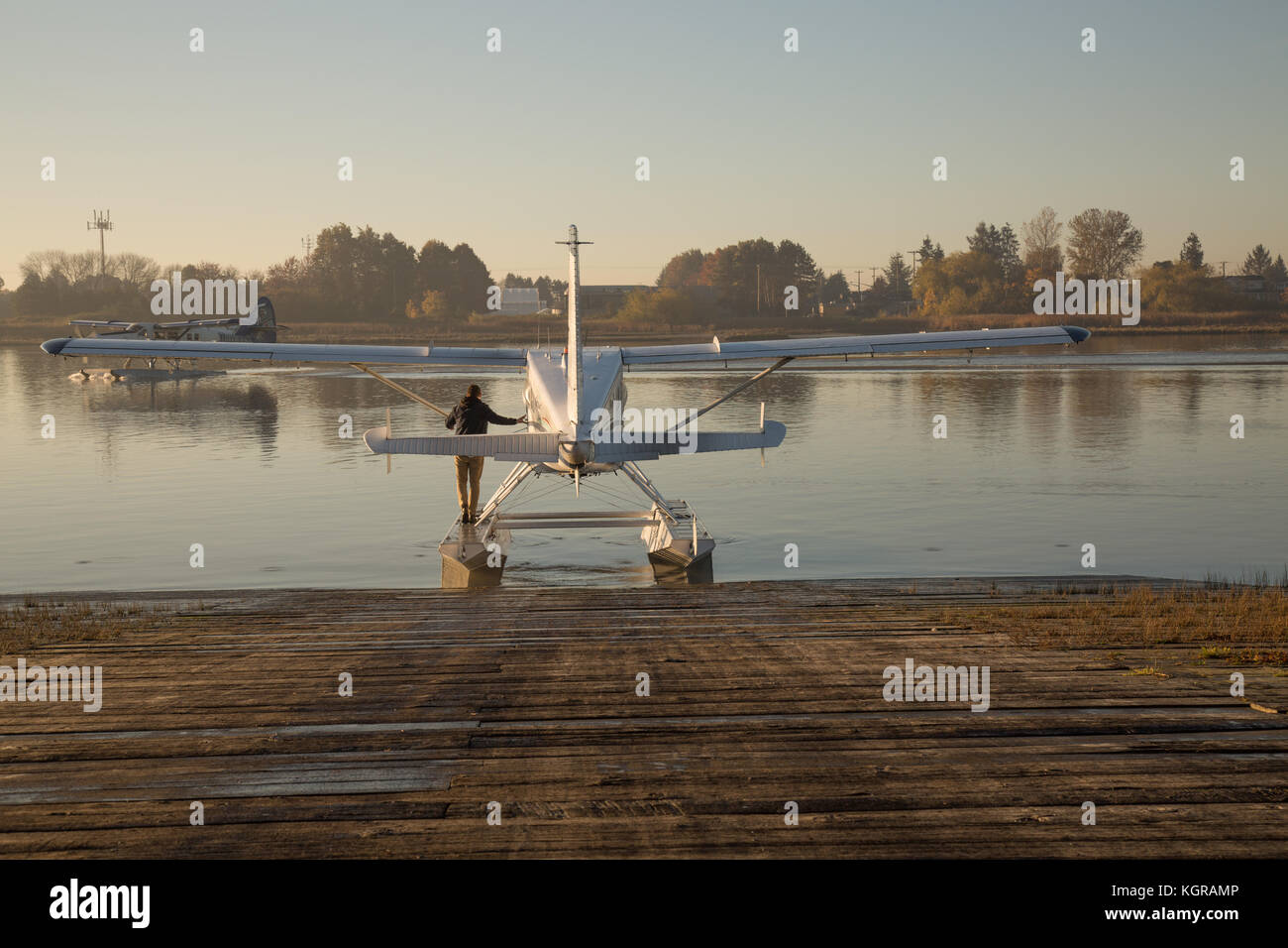 Pilot boarding hydroplane water surface autumn Stock Photo - Alamy