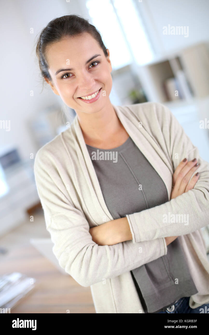 Portrait of smiling working woman in office Stock Photo - Alamy