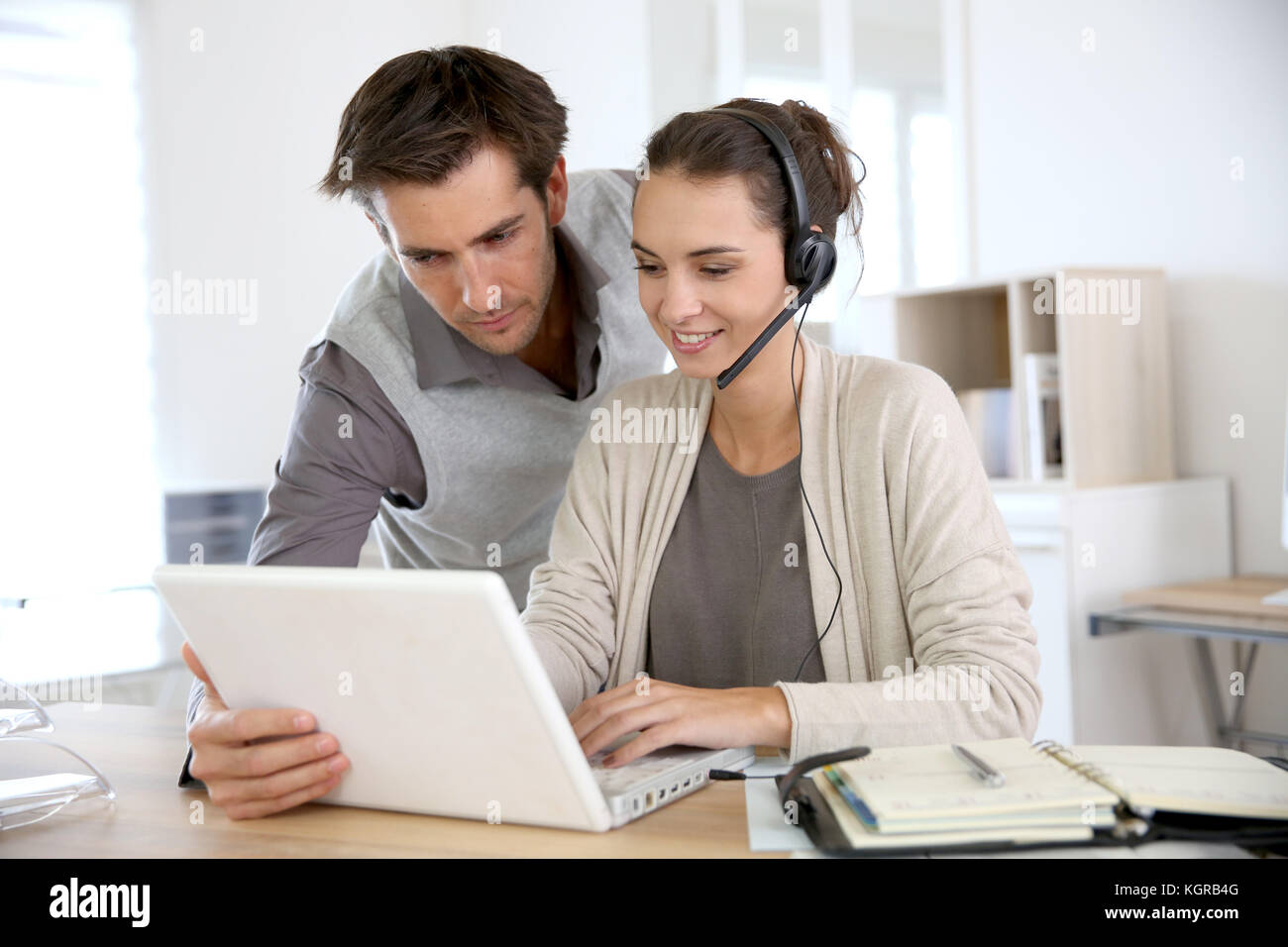 Business people working in customer service department Stock Photo - Alamy