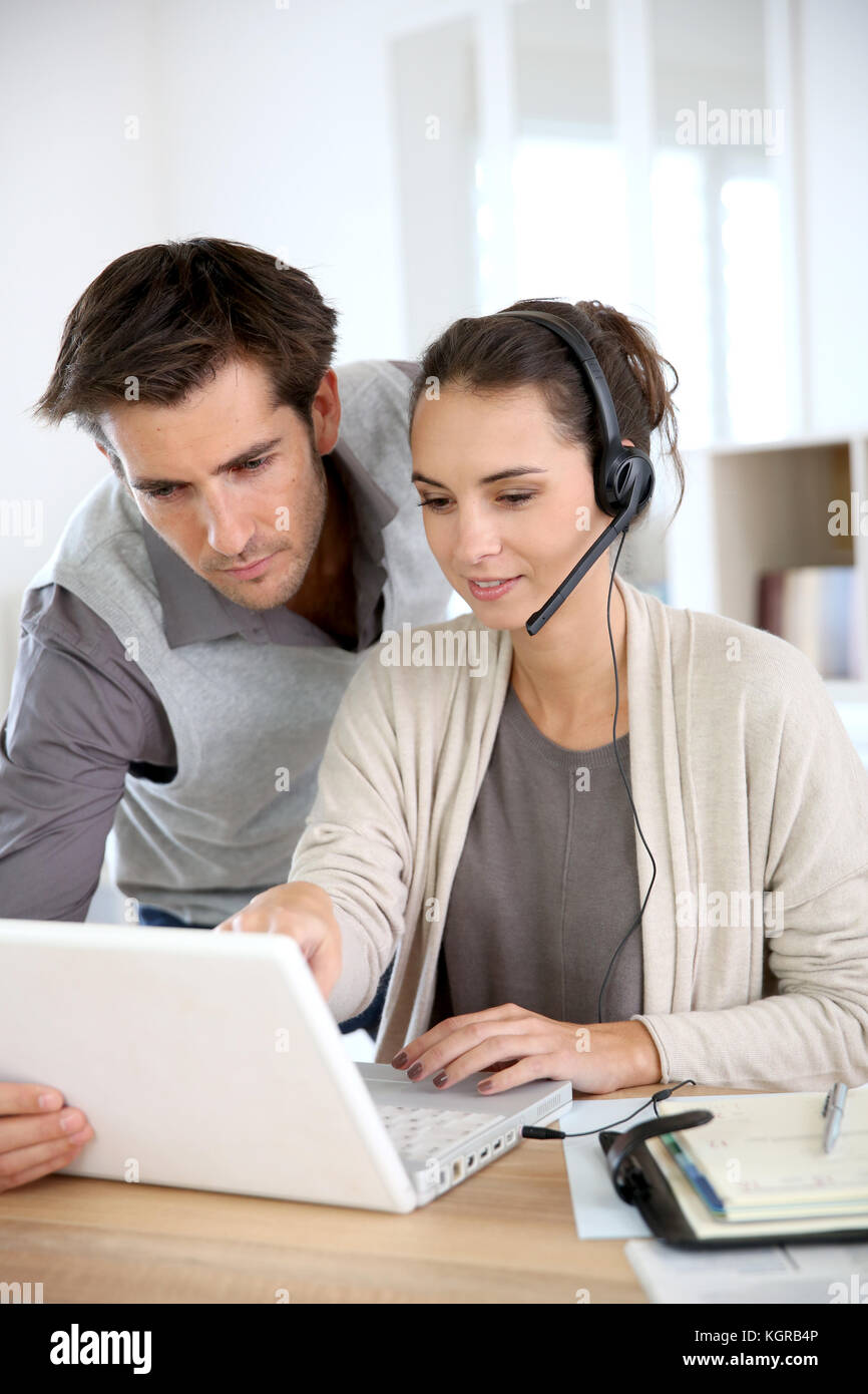 Business people working in customer service department Stock Photo - Alamy