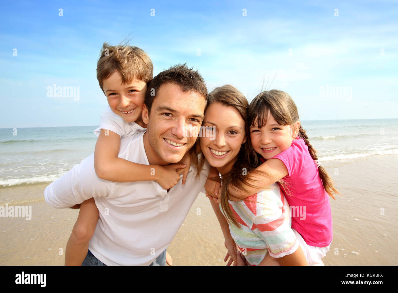 Boy giving piggyback ride girl hi-res stock photography and images - Alamy