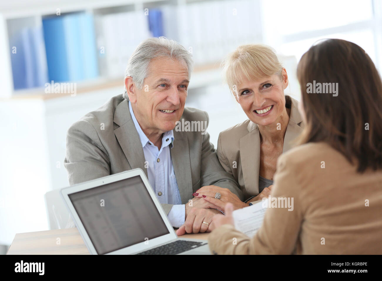 Senior couple meeting financial adviser in office Stock Photo - Alamy Senior couple meeting financial adviser in office Stock Photo - Alamy