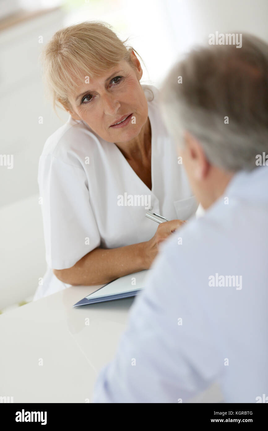Visiting doctor office hi-res stock photography and images - Alamy