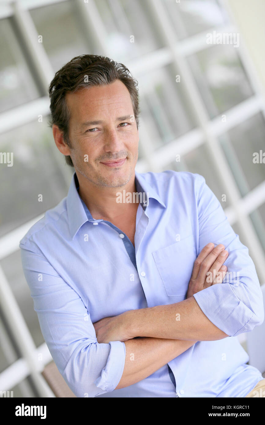 Portrait of handsome and smart businessman Stock Photo - Alamy