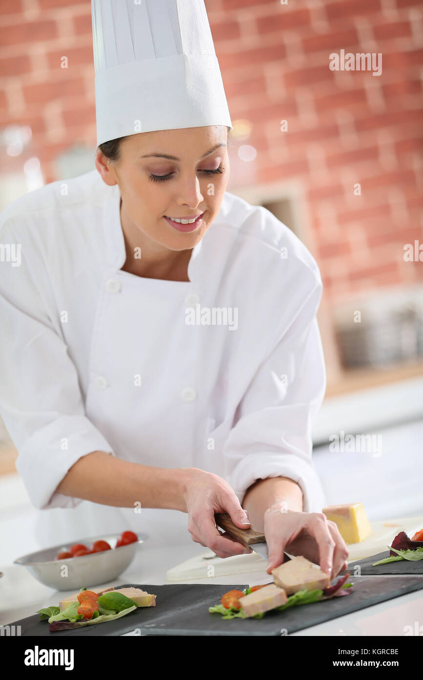 Young chef preparing plate of foie gras Stock Photo - Alamy