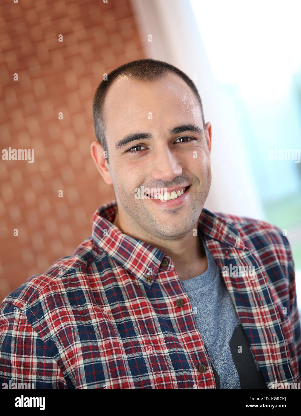 Portrait of cheerful student guy Stock Photo - Alamy