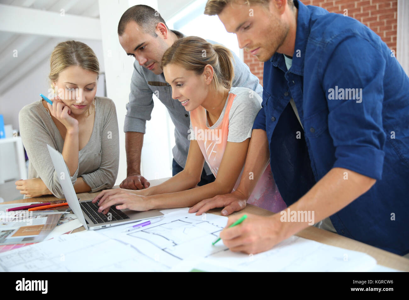 Young team of students working on project Stock Photo - Alamy