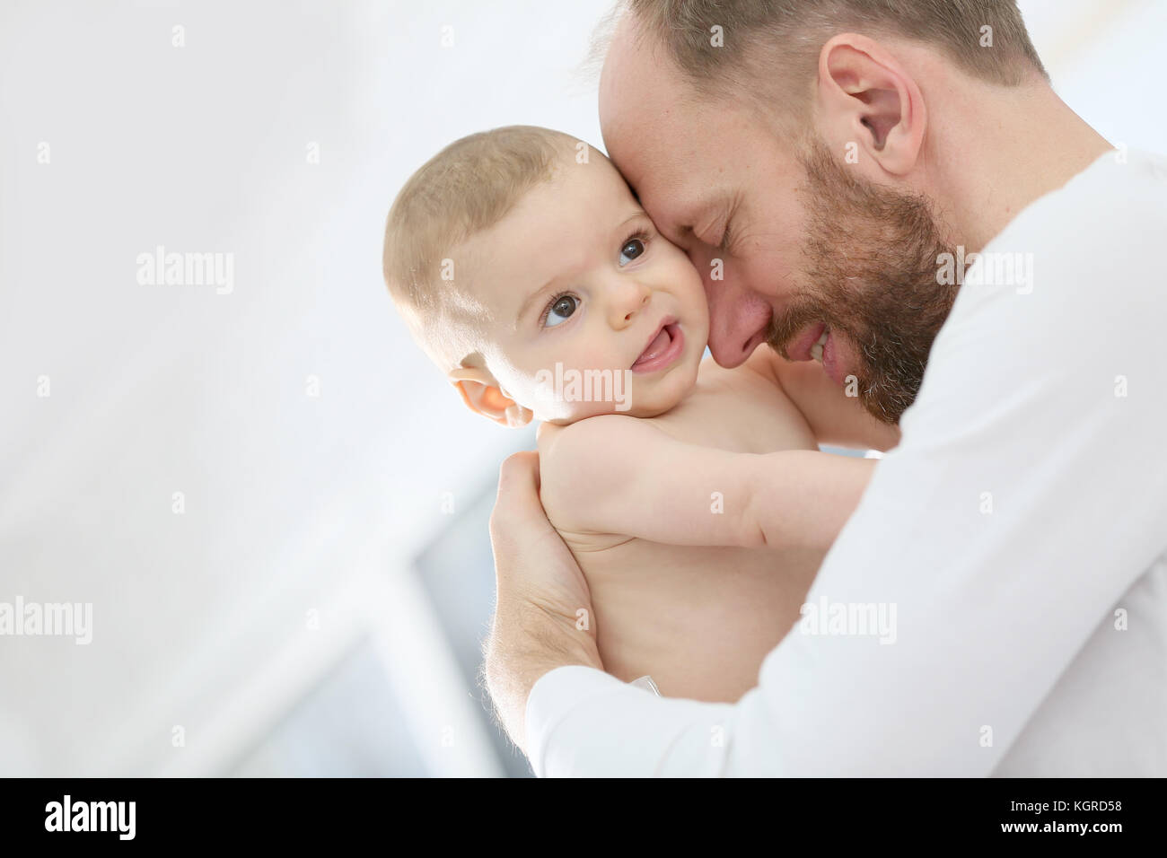 Father Kissing Hugging Toddler Boy High Resolution Stock Photography ...