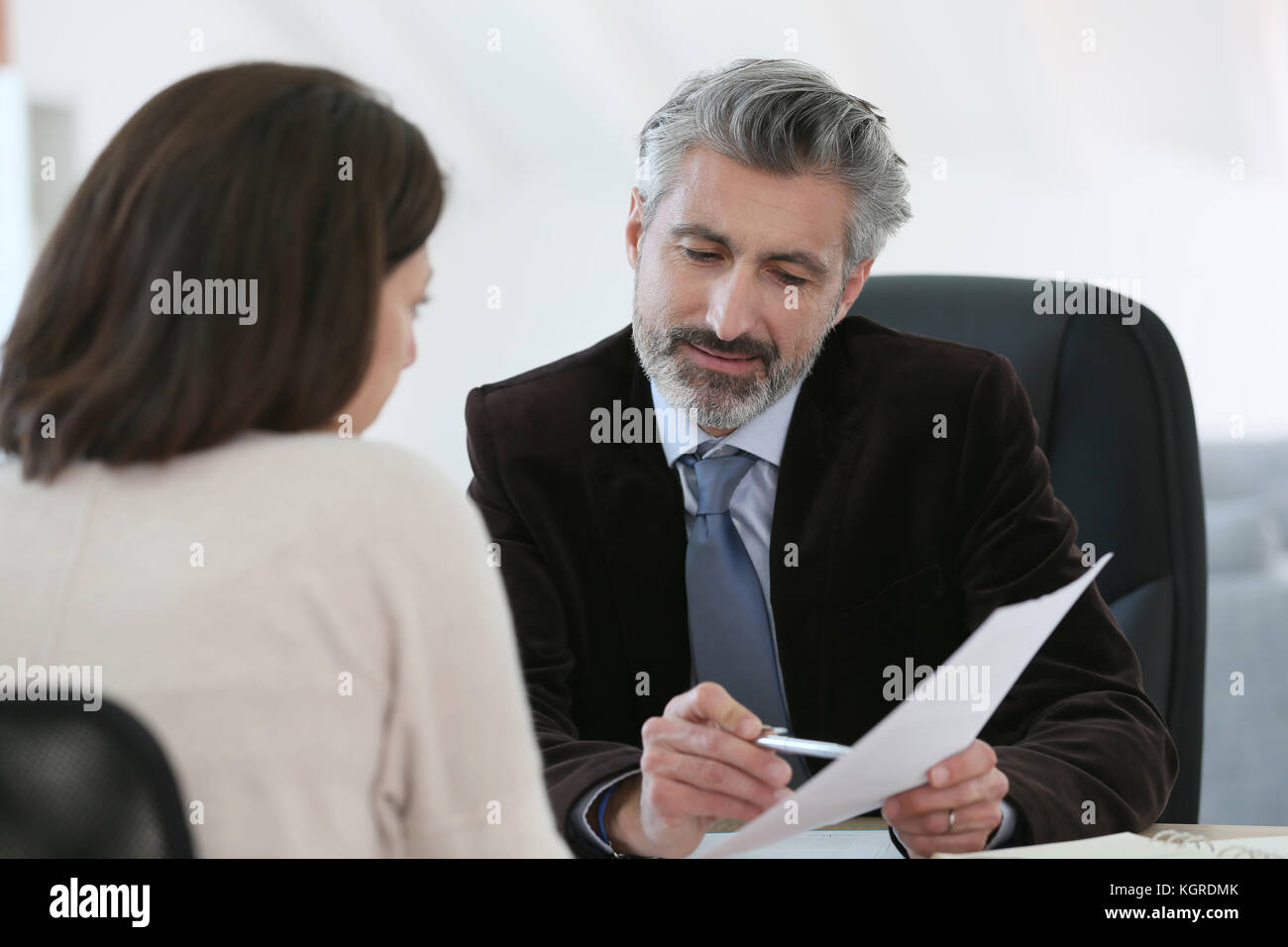 Attorney meeting client in office Stock Photo - Alamy