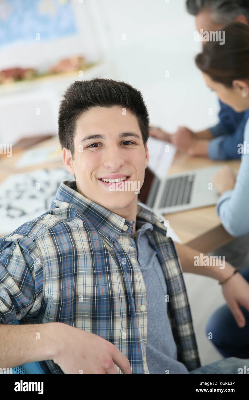 Portrait of college boy attending class Stock Photo - Alamy
