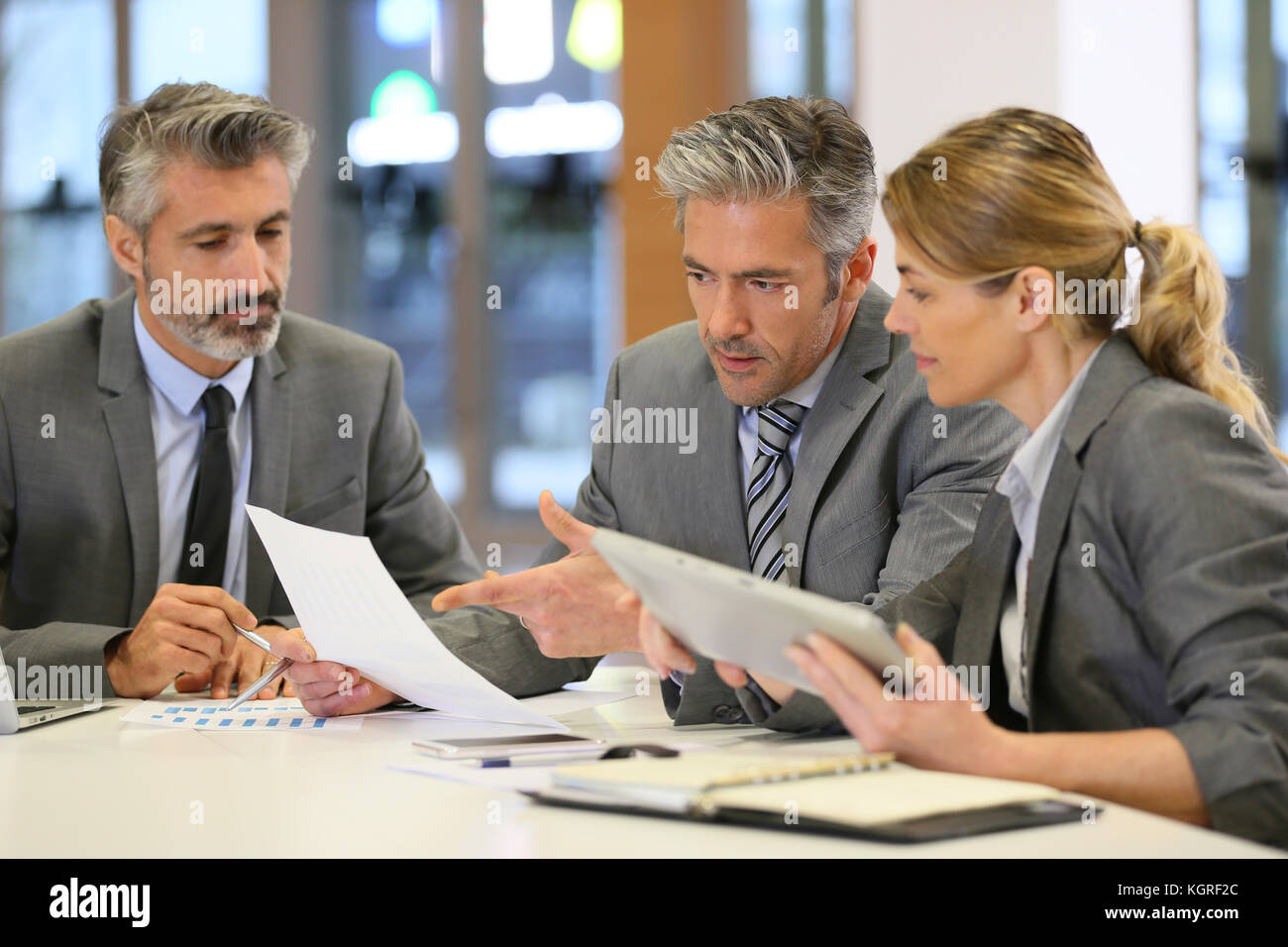 Business people in a financial meeting Stock Photo - Alamy