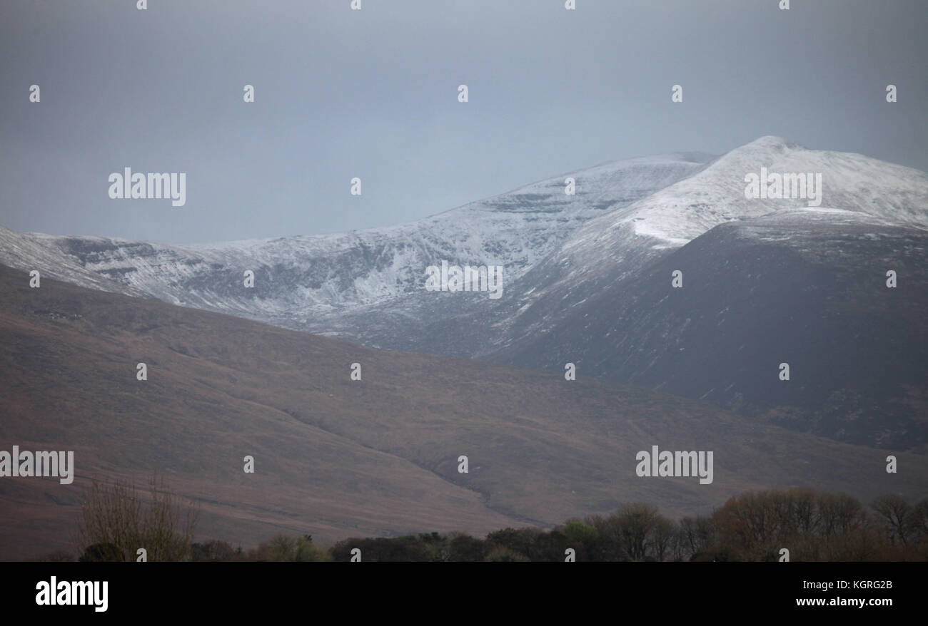 Snow on the Kerry mountains Stock Photo - Alamy