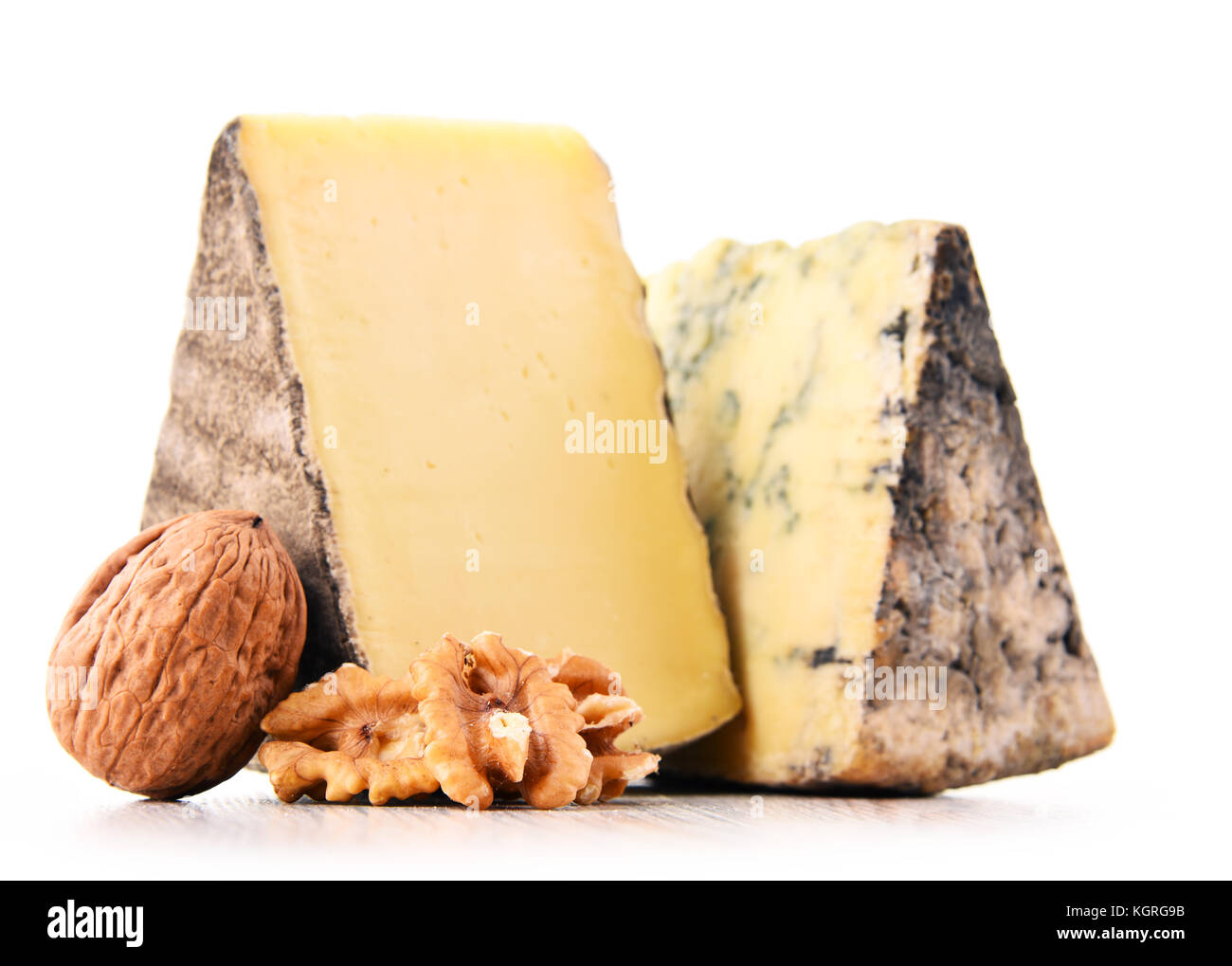 Two pieces of cheese isolated in white background Stock Photo - Alamy