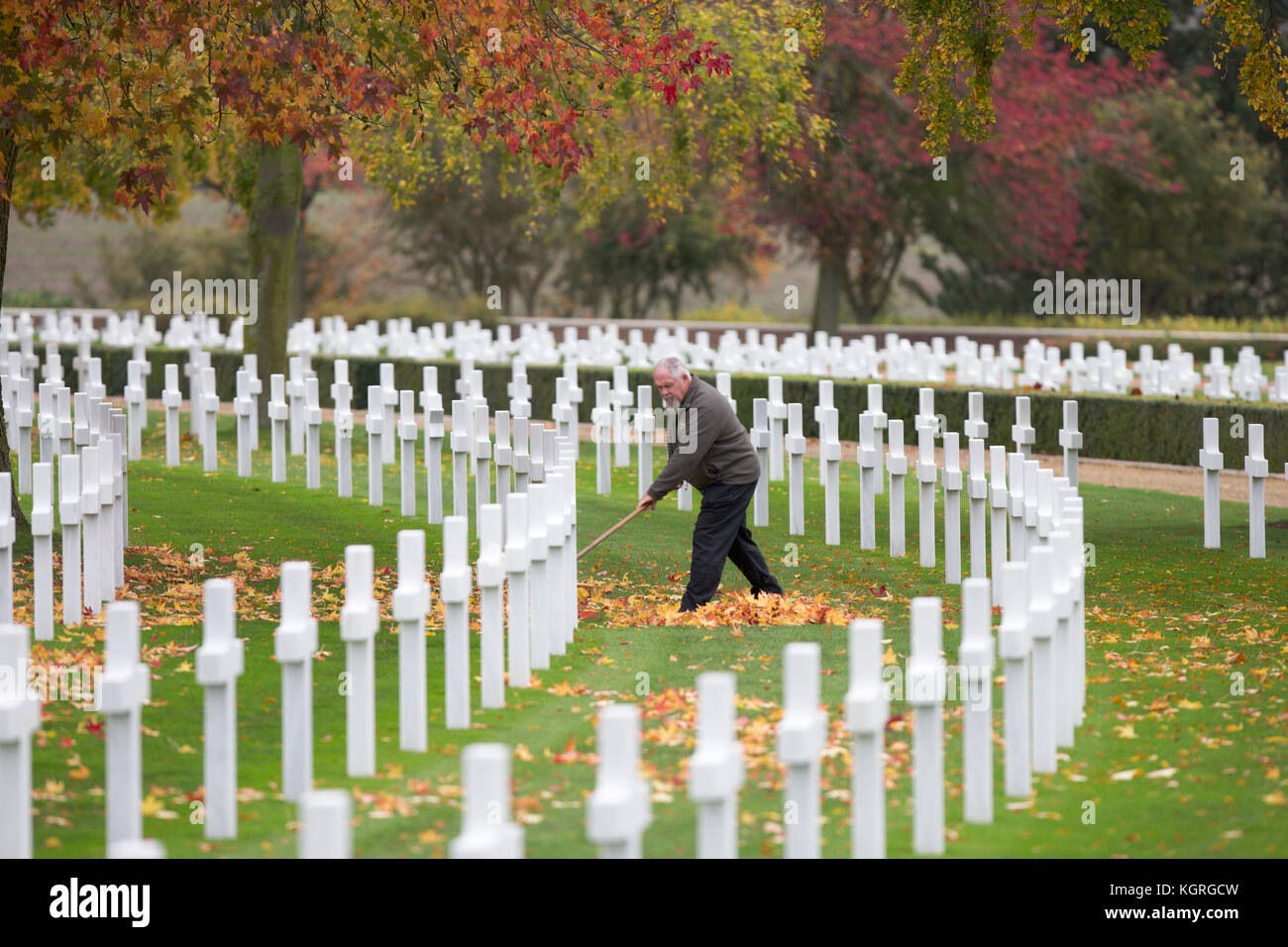 Gardener Mick Howard cleaning one of the 3,811 headstones at the ...