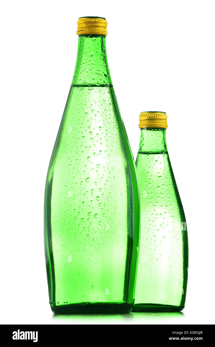 Glass bottles of mineral water isolated on white background Stock Photo - Alamy