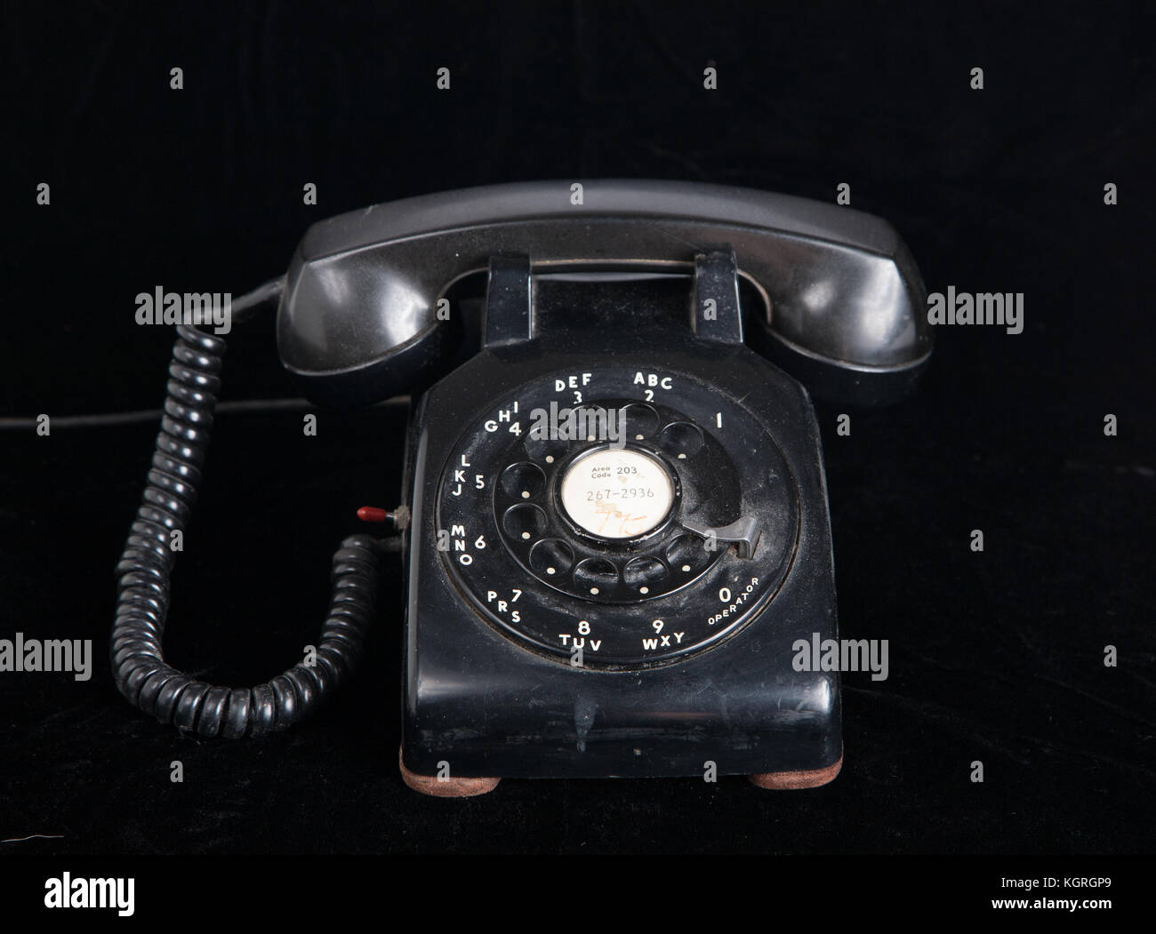 Black Rotary Telephone on Black Backdrop Stock Photo - Alamy