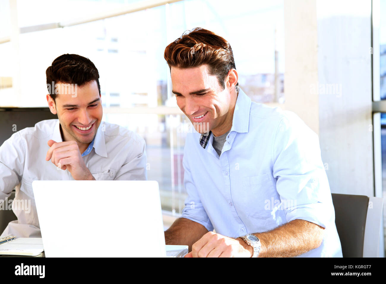 College students in classroom with laptop Stock Photo - Alamy