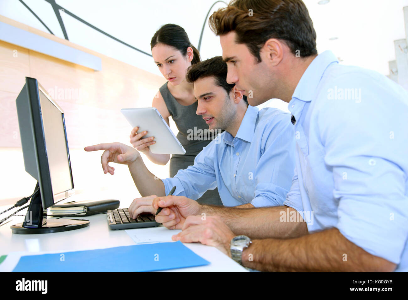 Sales people meeting in office Stock Photo - Alamy