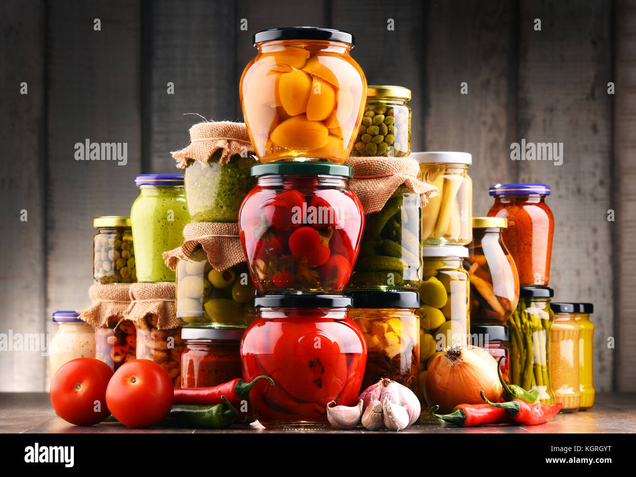 Jars with variety of pickled vegetables. Preserved food Stock Photo - Alamy