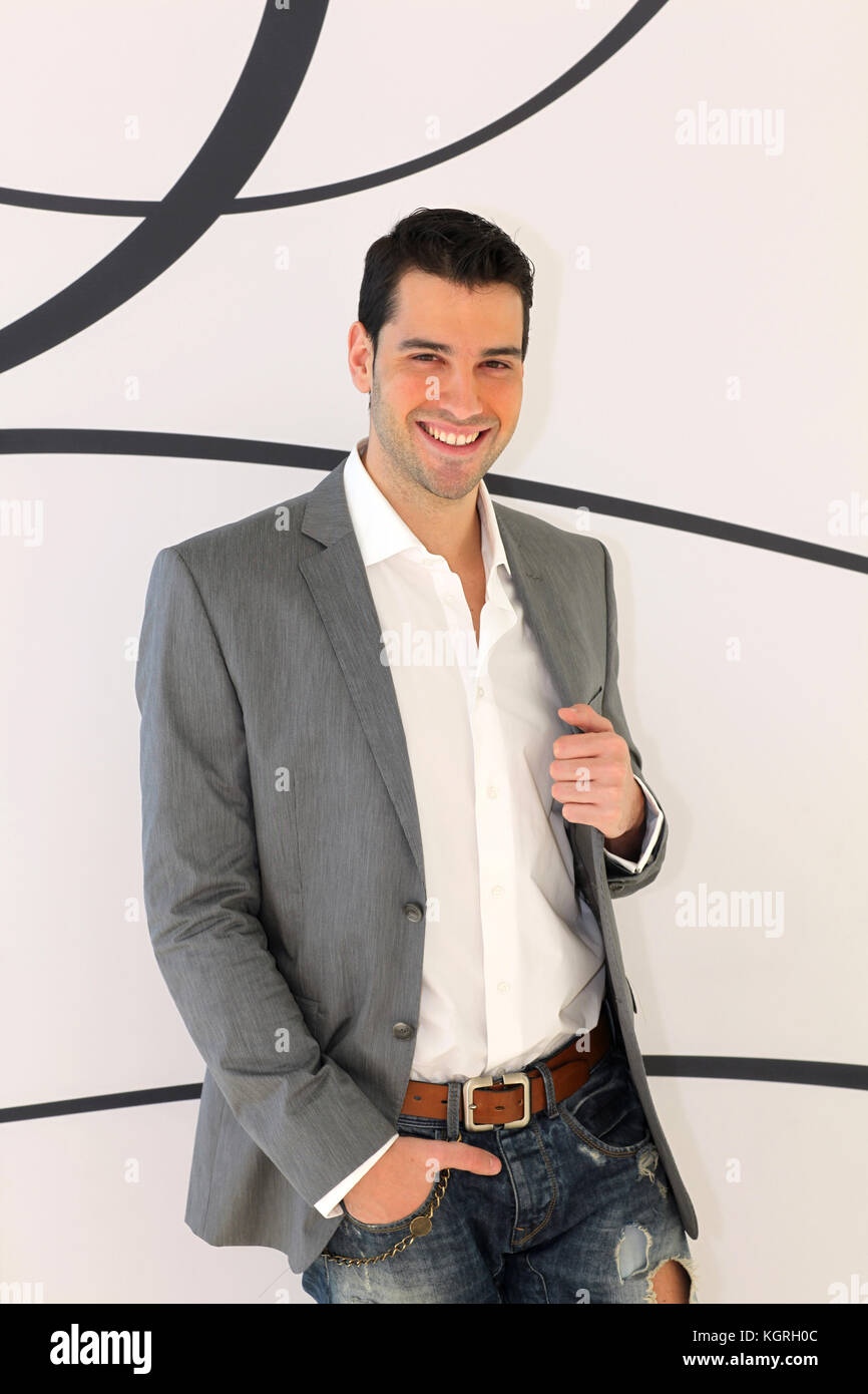 Young modern and cheerful man Stock Photo - Alamy