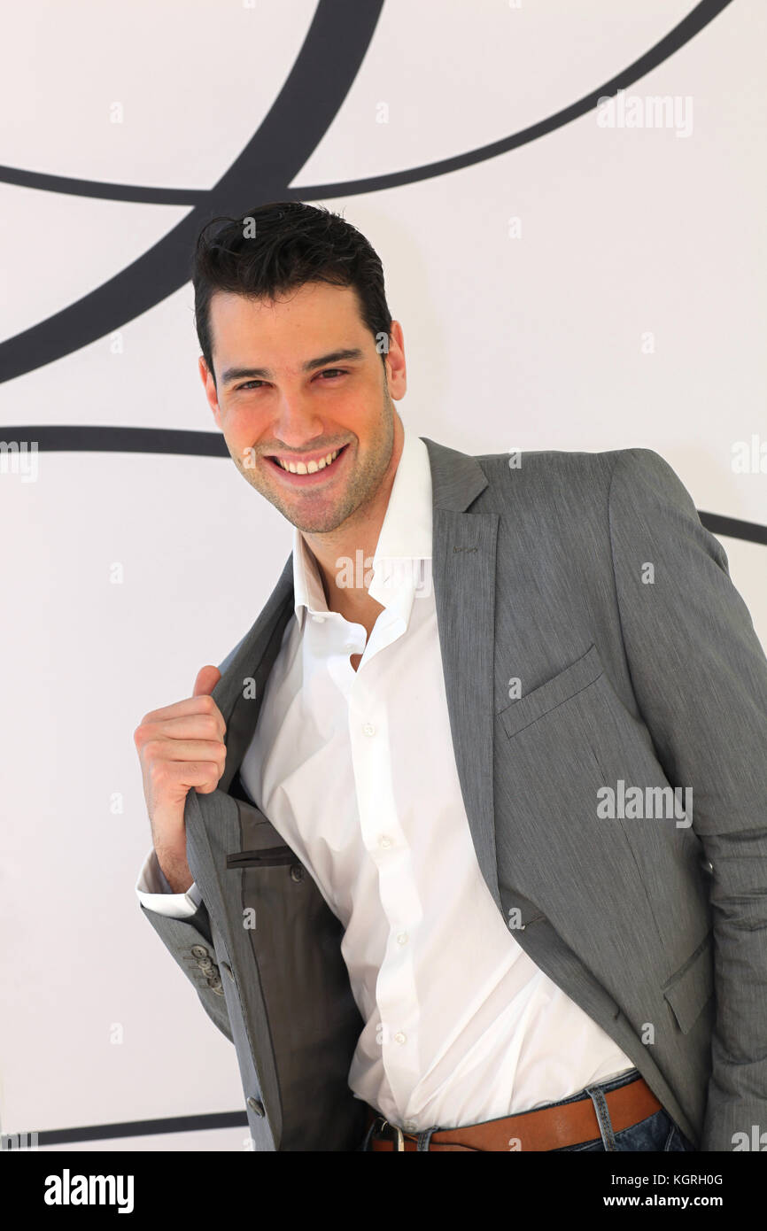 Young modern and cheerful man Stock Photo - Alamy