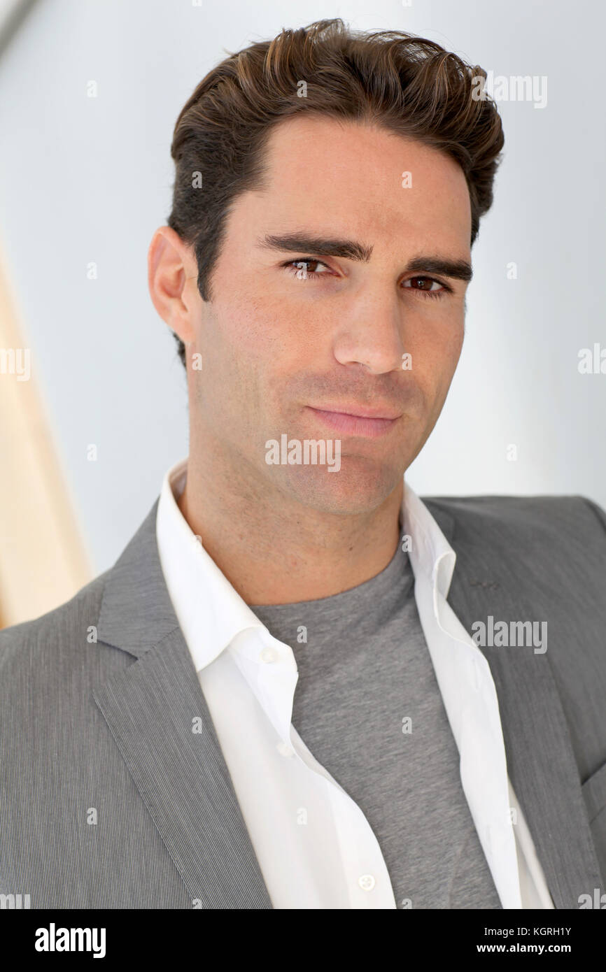 Handsome relaxed young man Stock Photo - Alamy