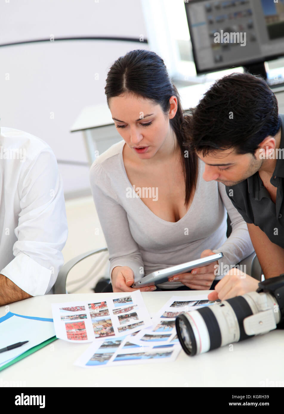 Work meeting in photo agency Stock Photo - Alamy