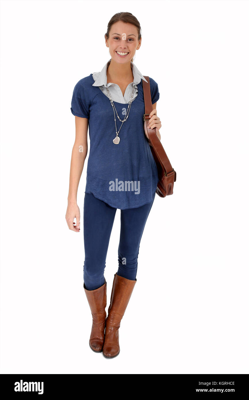 Trendy city girl standing on white background Stock Photo - Alamy