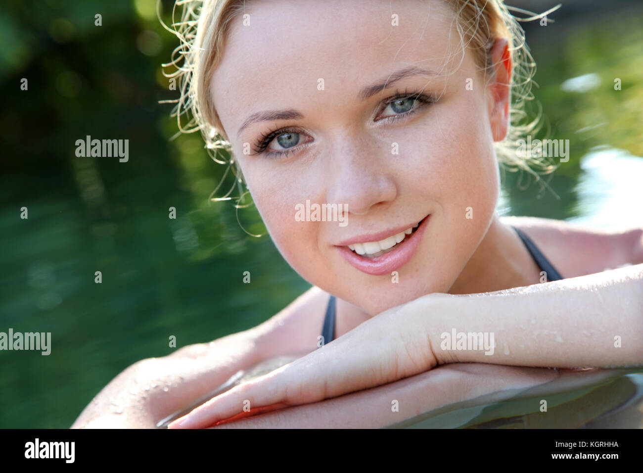 Portrait of beautiful woman in water Stock Photo - Alamy