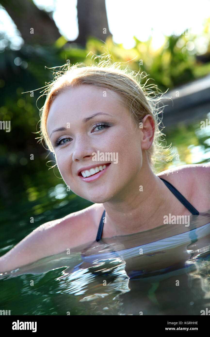 Portrait of beautiful woman in water Stock Photo - Alamy