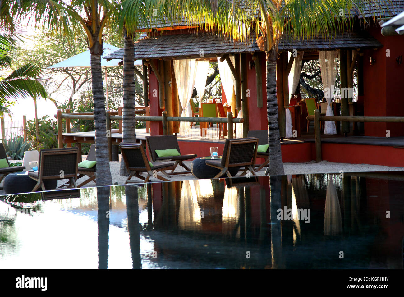 View of resort restaurant terrace and pool Stock Photo - Alamy