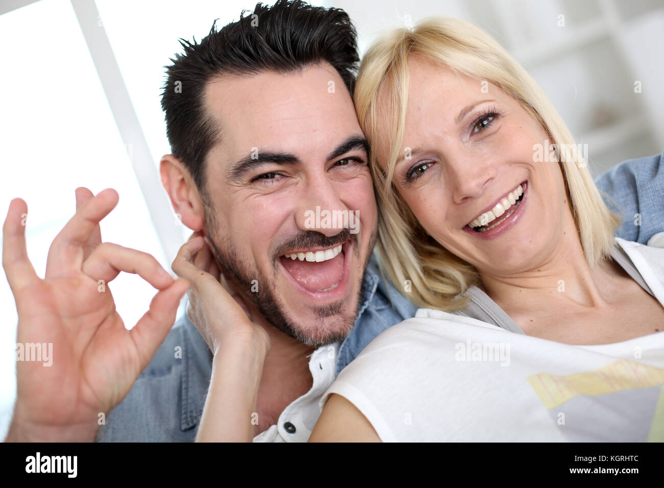 Cheerful couple having fun Stock Photo - Alamy