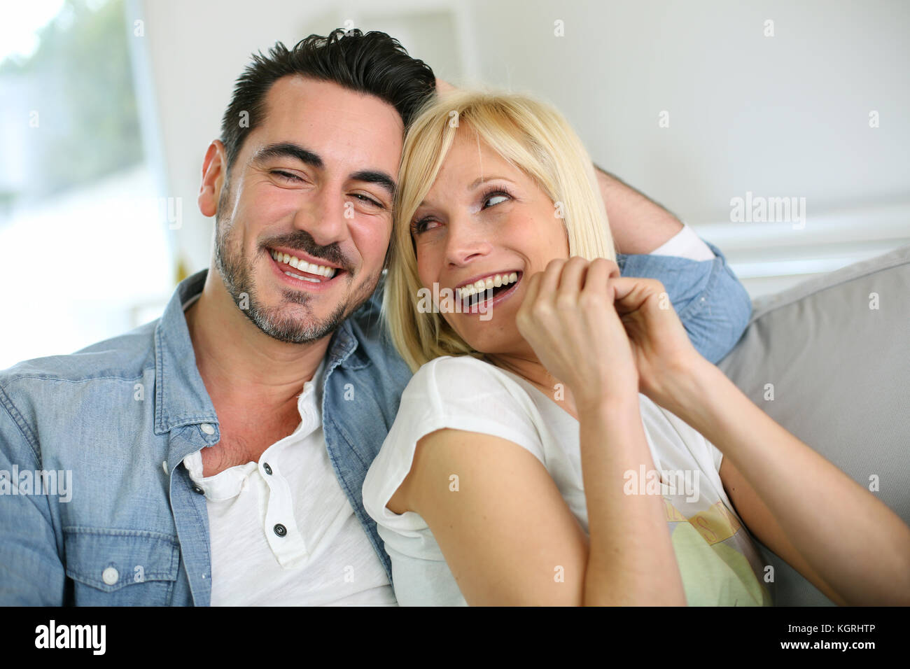Cheerful couple having fun Stock Photo - Alamy