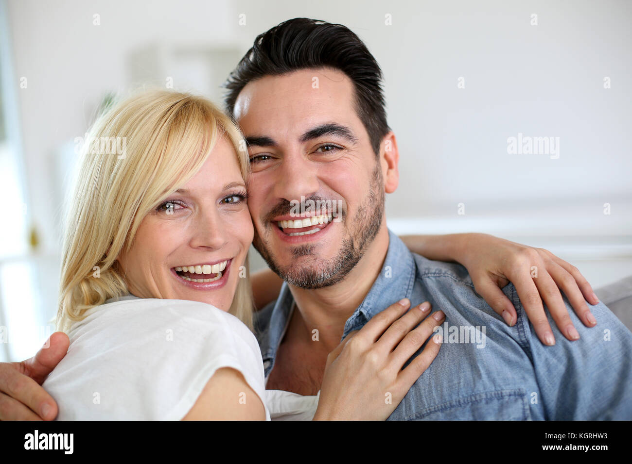 Cheerful couple having fun together Stock Photo - Alamy