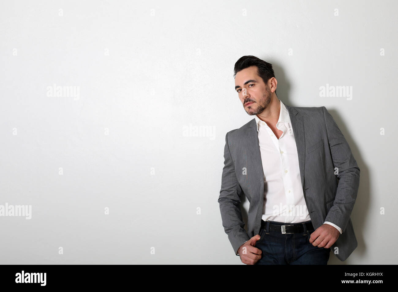 Middle-aged man standing on white background Stock Photo - Alamy