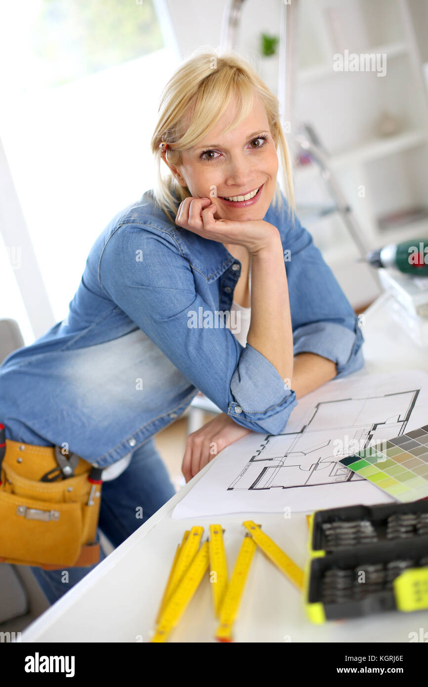 Woman working on home improvement planning Stock Photo - Alamy