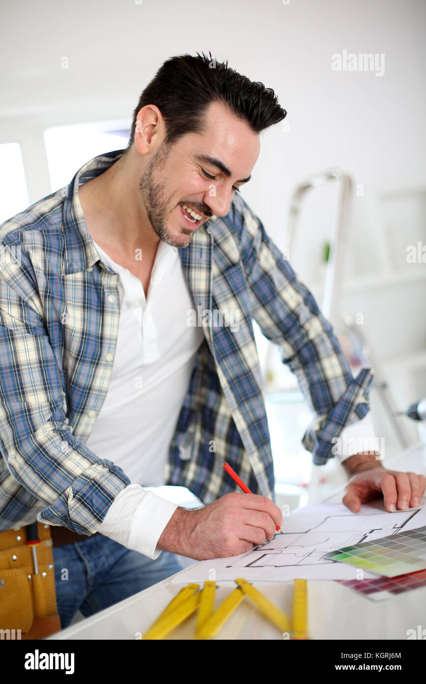 Man designing new house interior Stock Photo - Alamy
