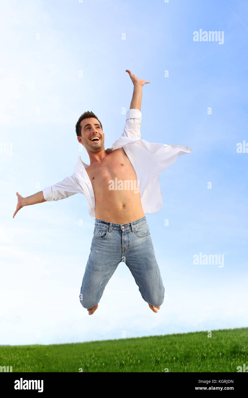 Man jumping in the air with joy Stock Photo - Alamy
