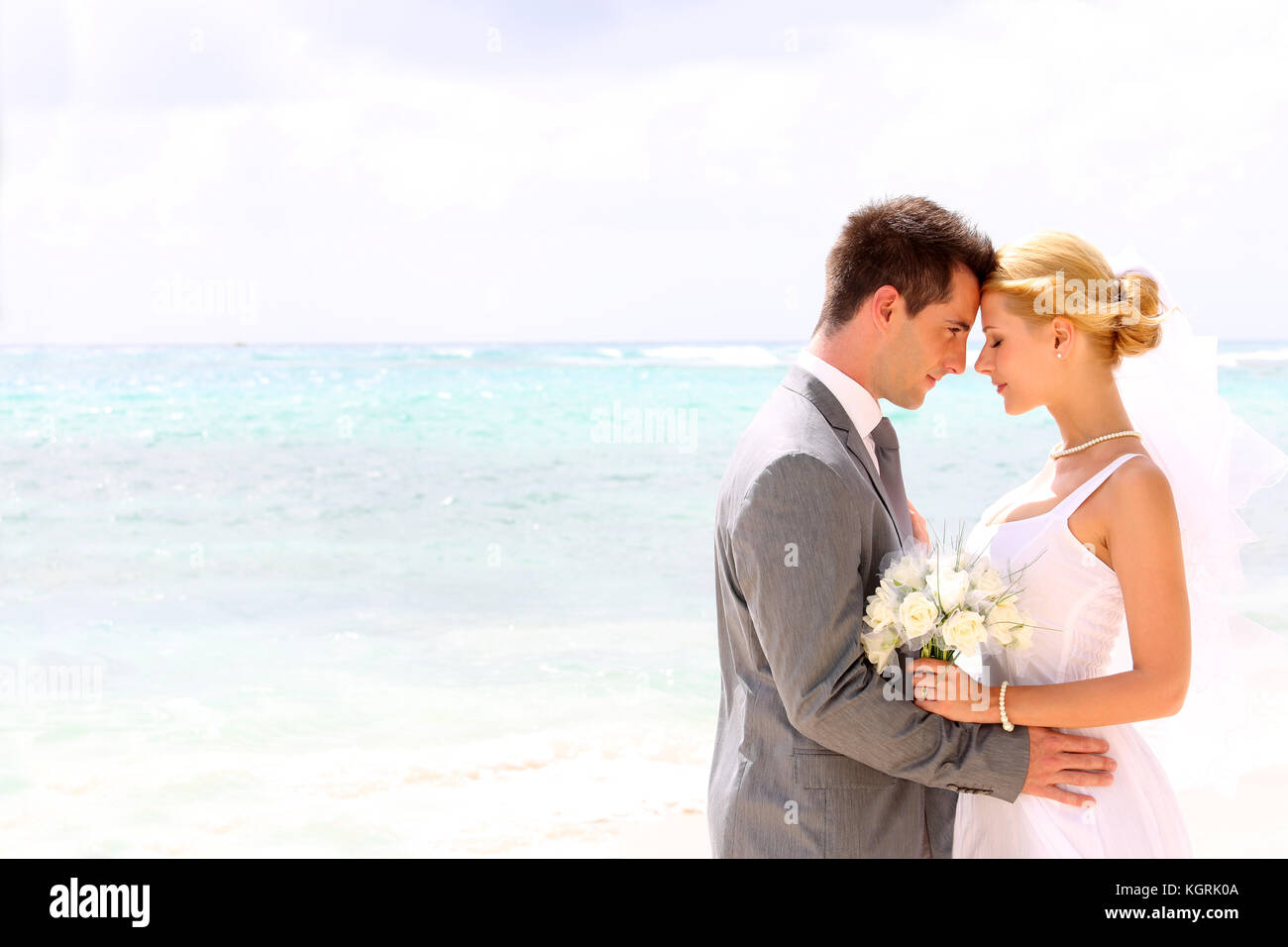 Bride and groom on a romantic moment Stock Photo - Alamy