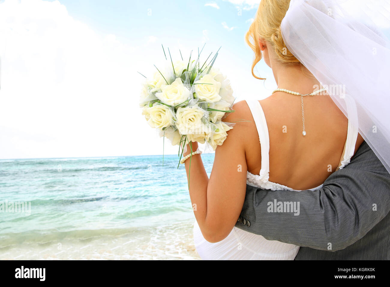 Just married couple looking towards the future Stock Photo - Alamy