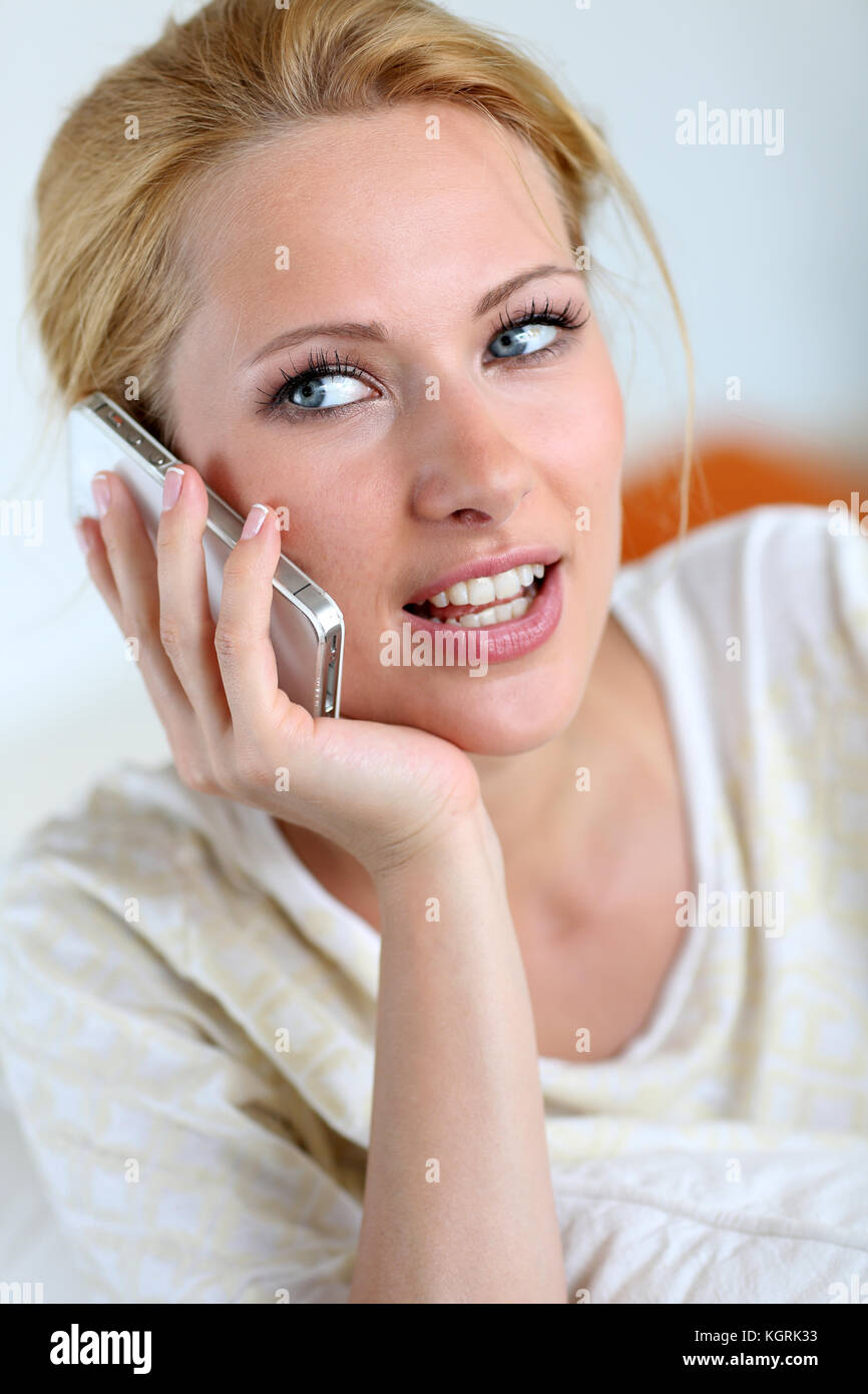 Blond woman on smartphone hand hi-res stock photography and images - Alamy
