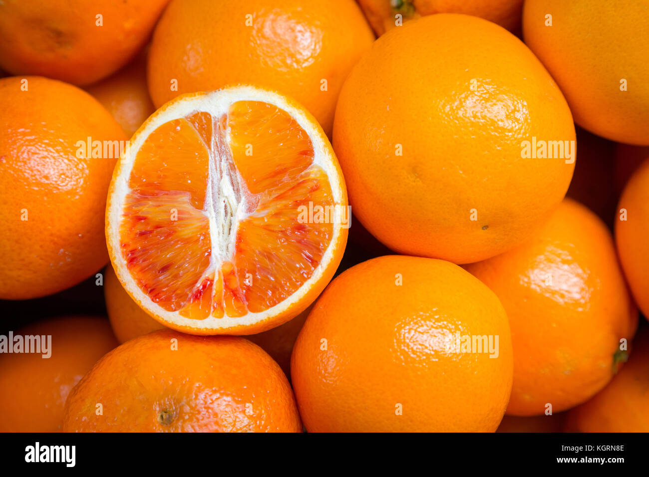 Fresh juicy oranges background Stock Photo - Alamy