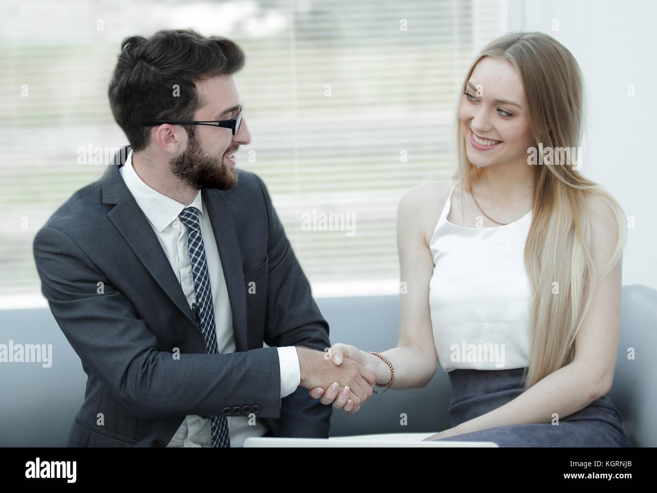 Successful job interview with boss and employee handshaking Stock Photo ...