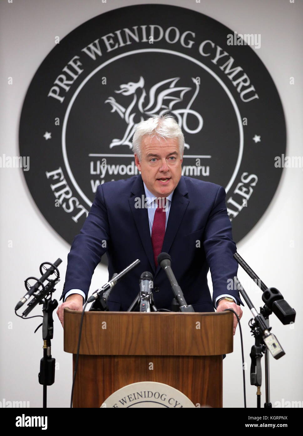 Pictured: First Minister for Wales, Carwyn Jones speaks to the media ...