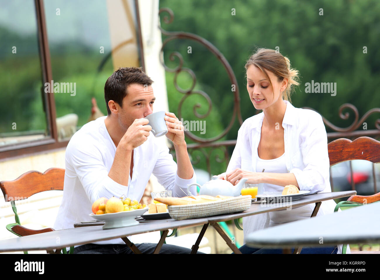 Romantic breakfast in hotel garden Stock Photo - Alamy