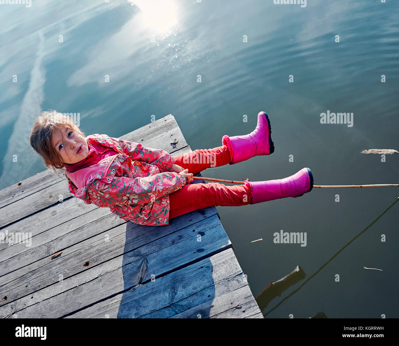 little girl fishing on the river Stock Photo - Alamy