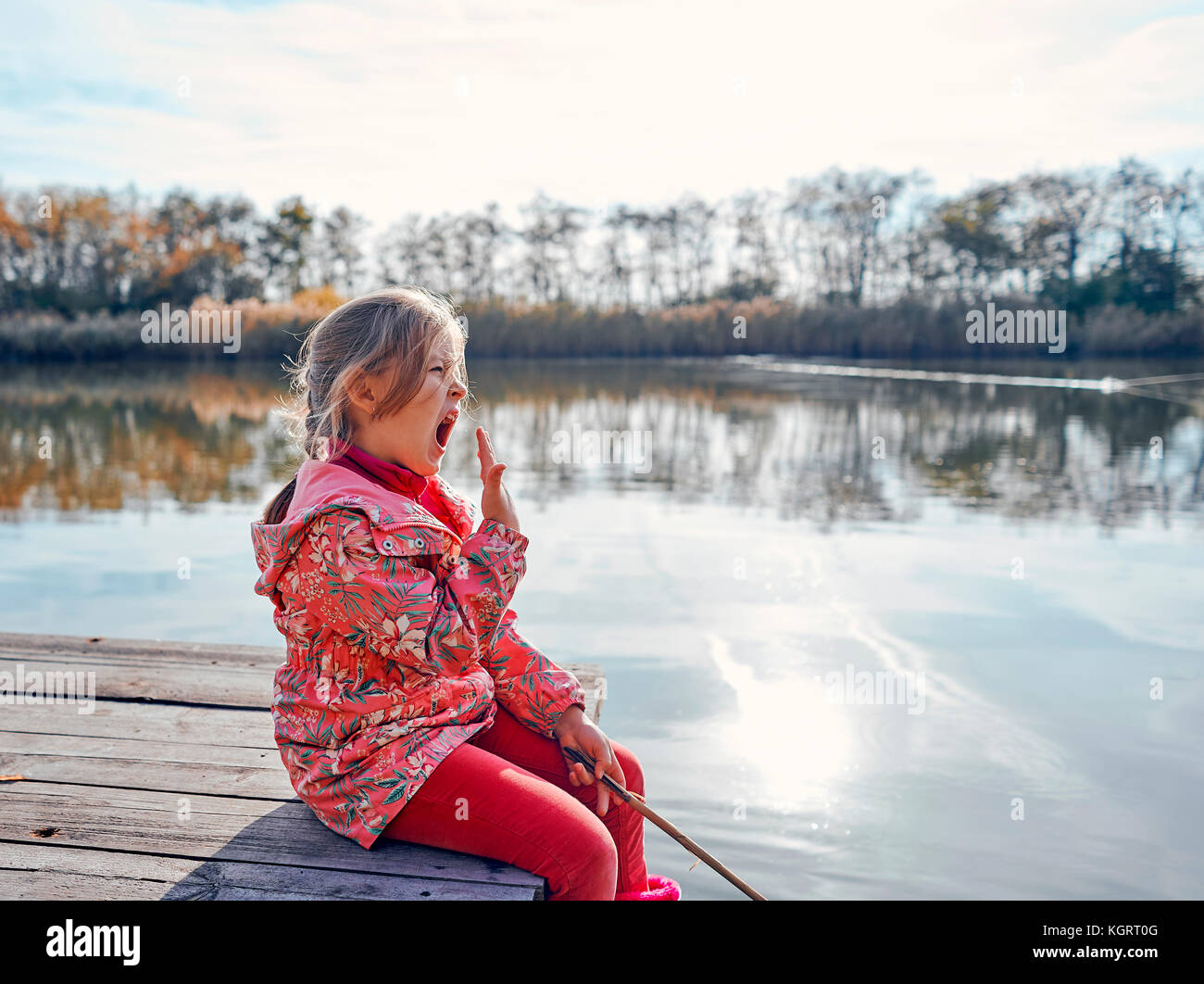 little girl fishing on the river Stock Photo - Alamy
