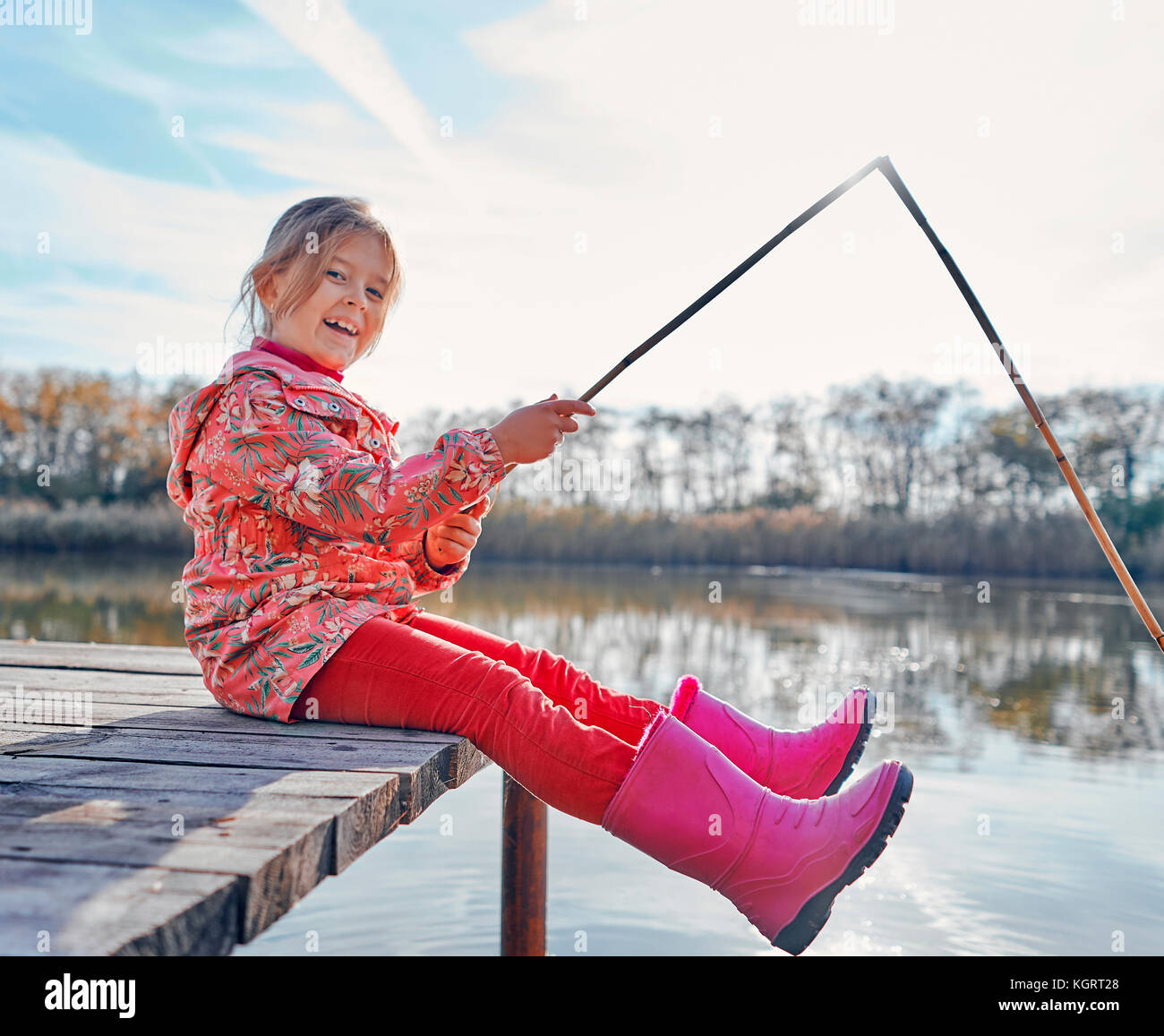 little girl fishing on the river Stock Photo - Alamy