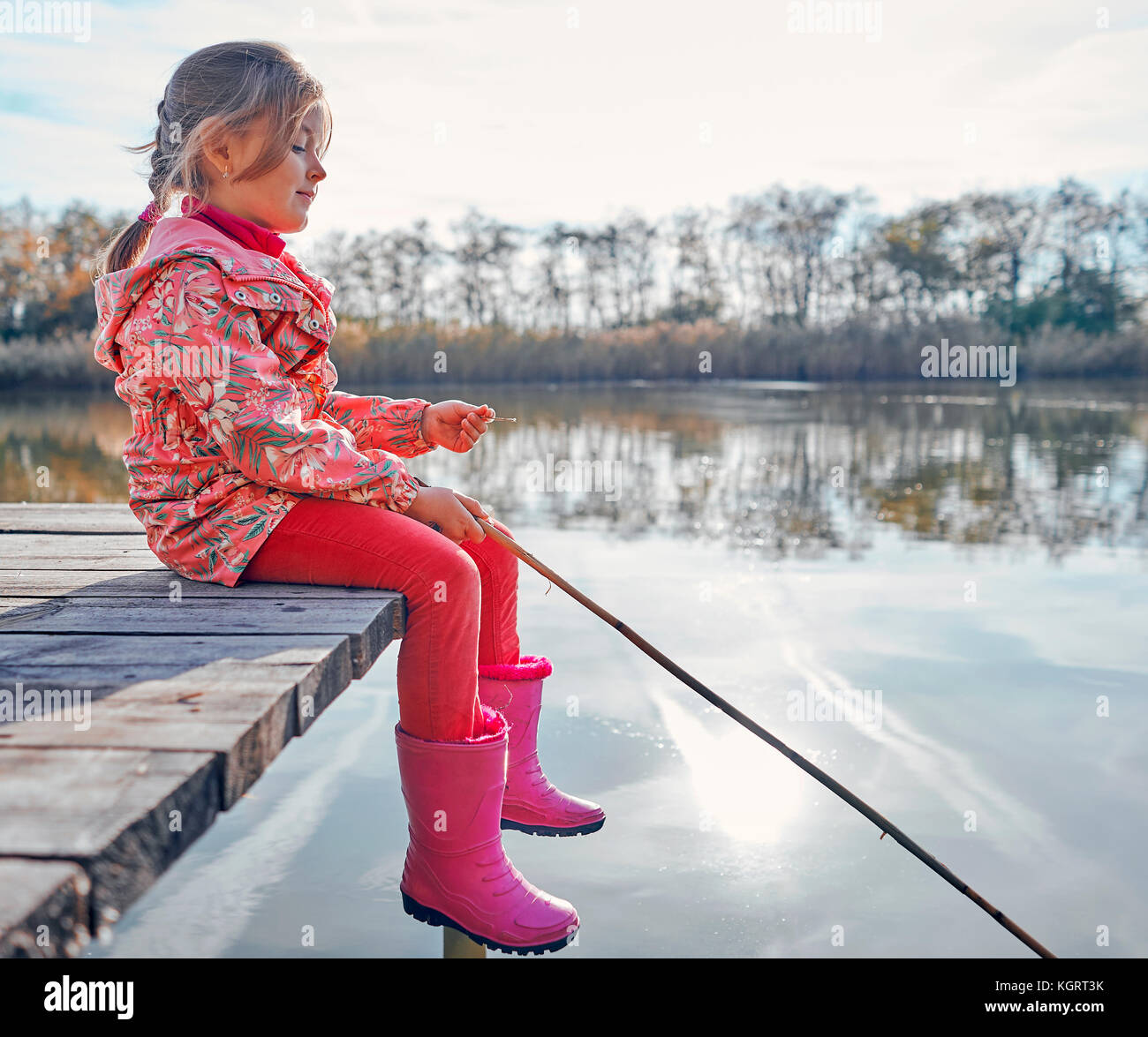 little girl fishing on the river Stock Photo - Alamy