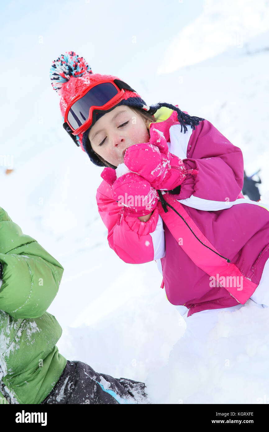 Girl blowing snow hi-res stock photography and images - Alamy